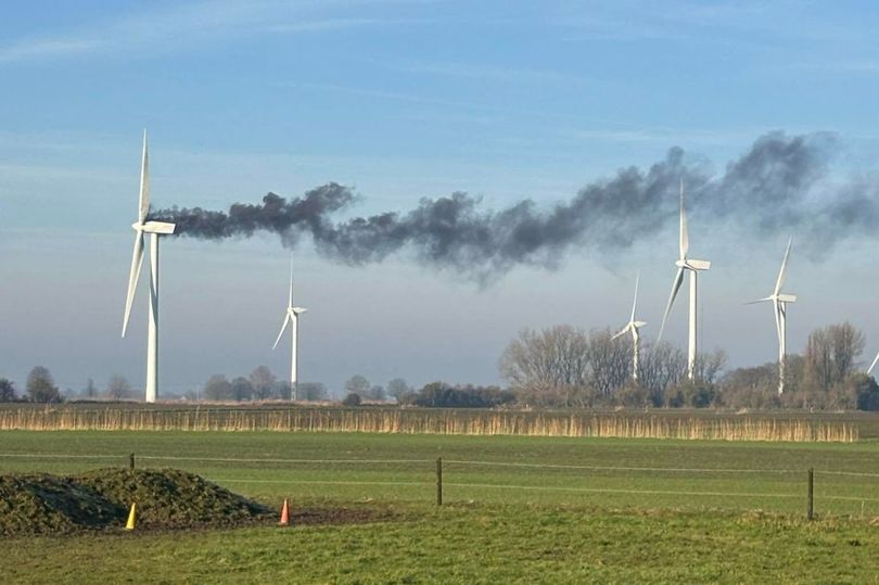 UK wind turbine bursts into flames filling sky with plume of smoke in ...