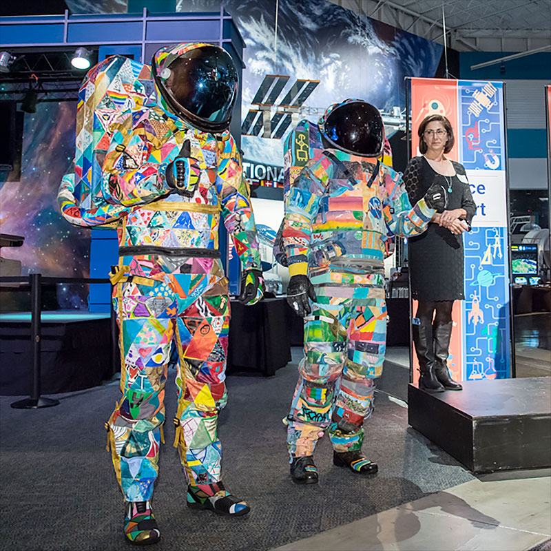 Astronaut's mission 'back to Earth' lands on colorful spacesuit patch