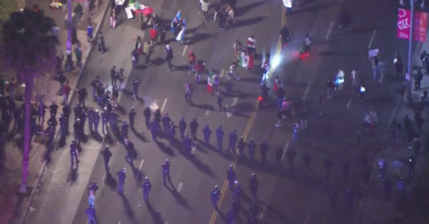 Protest in downtown Los Angeles over ICE raids blocks 101 Freeway
