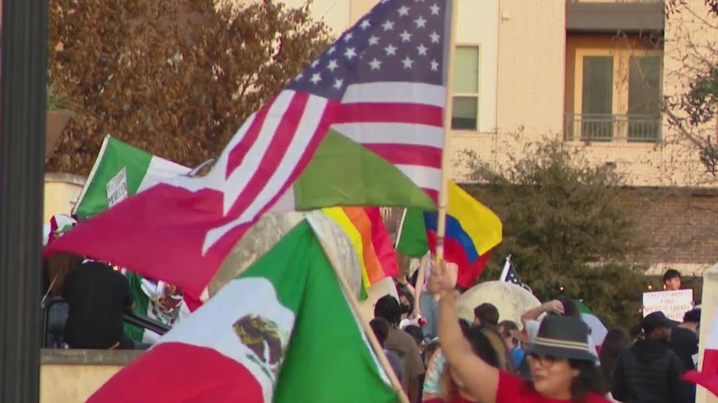 Hundreds rally against ICE raids at Arlington protest and rally