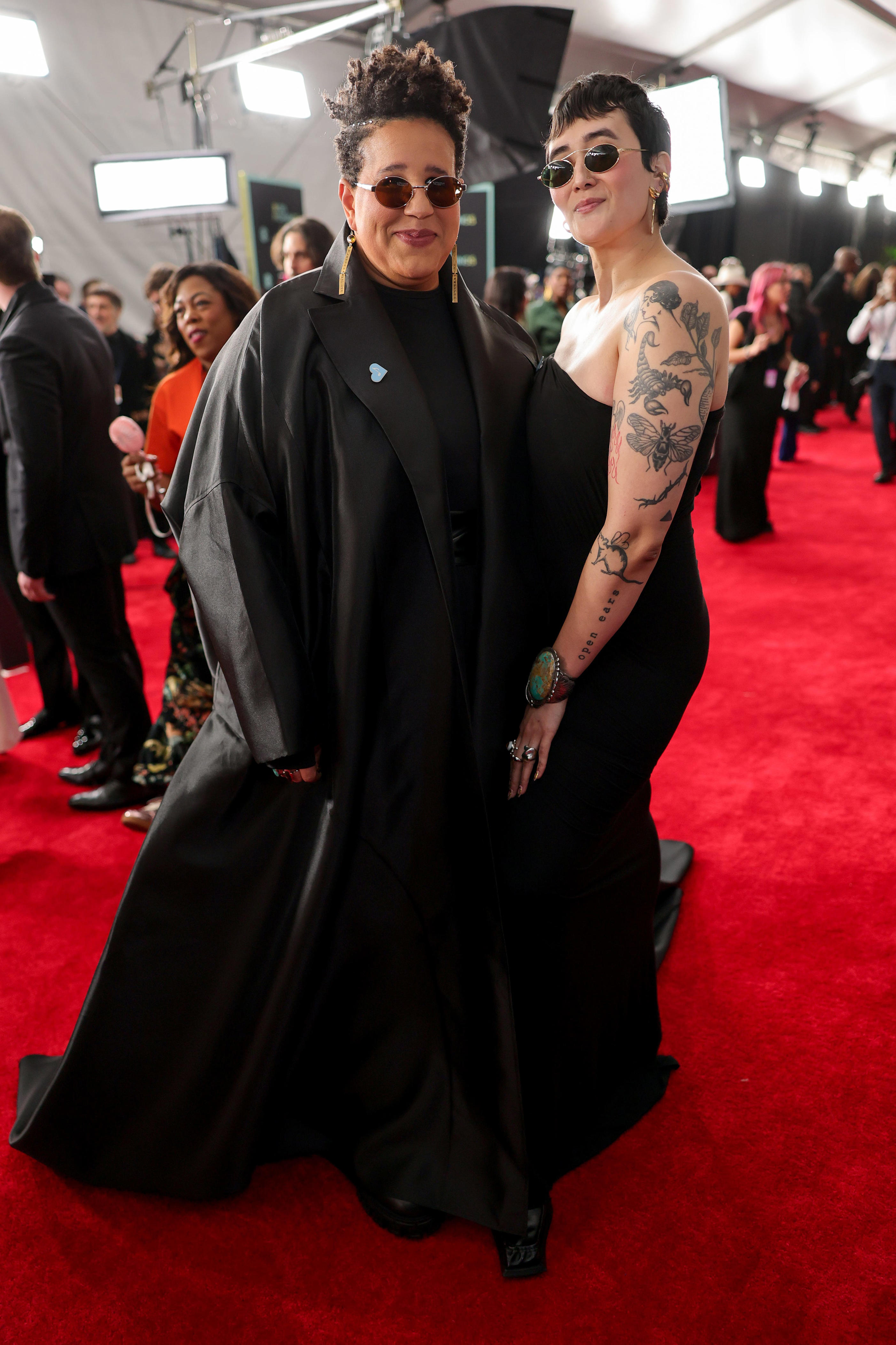 On Grammys red carpet, why are stars wearing blue pins?