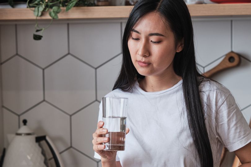 NHS warns that 'feeling of fullness' could be symptom of painful common ...