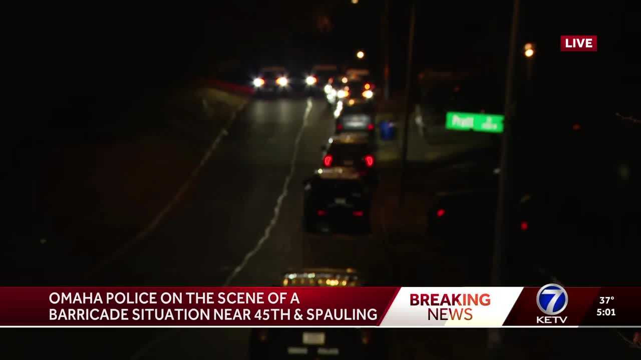 Police surround home in North Omaha Sunday night into Monday morning