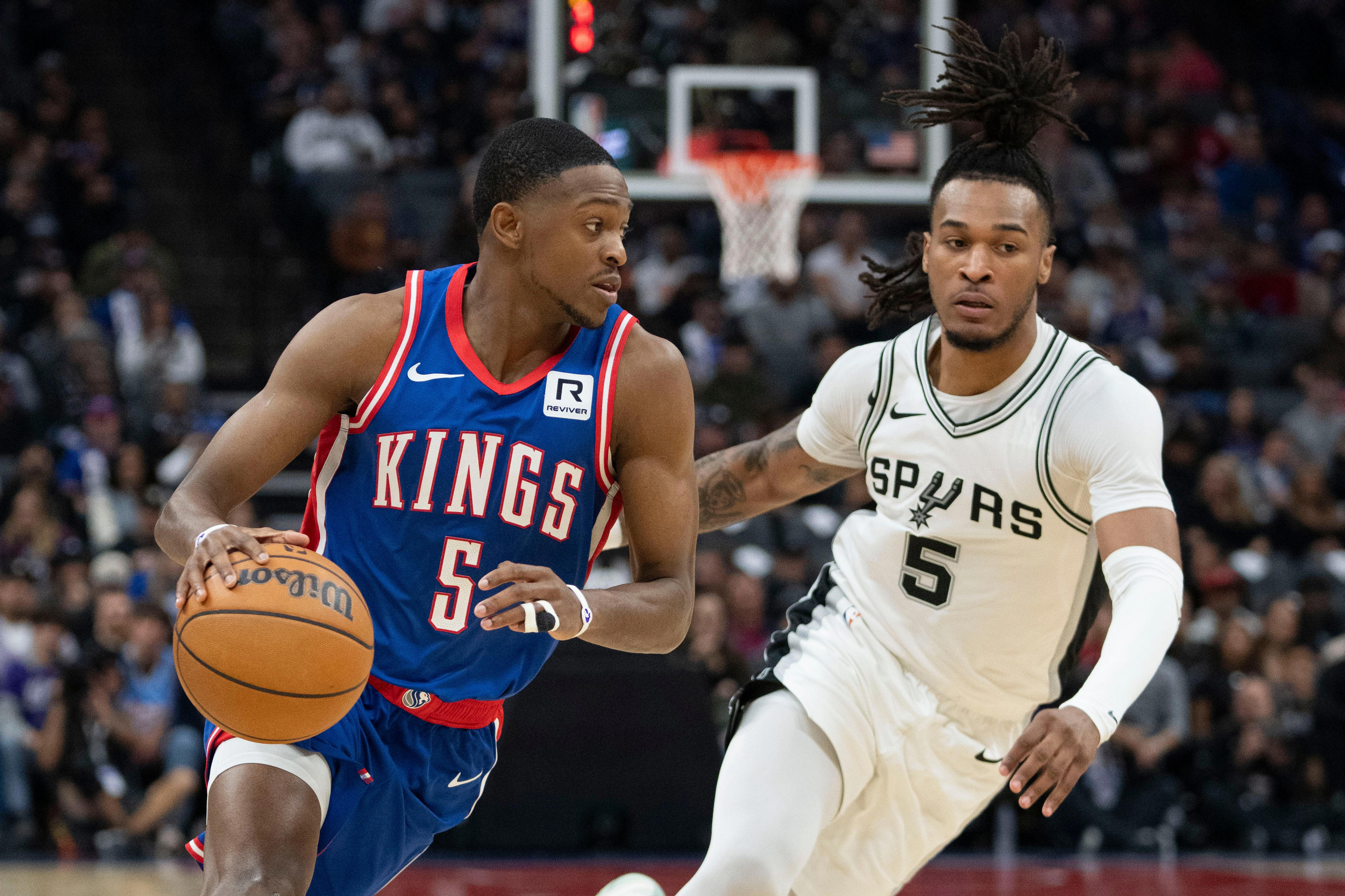 Projected starting lineup for the Spurs after a trade united De'Aaron ...