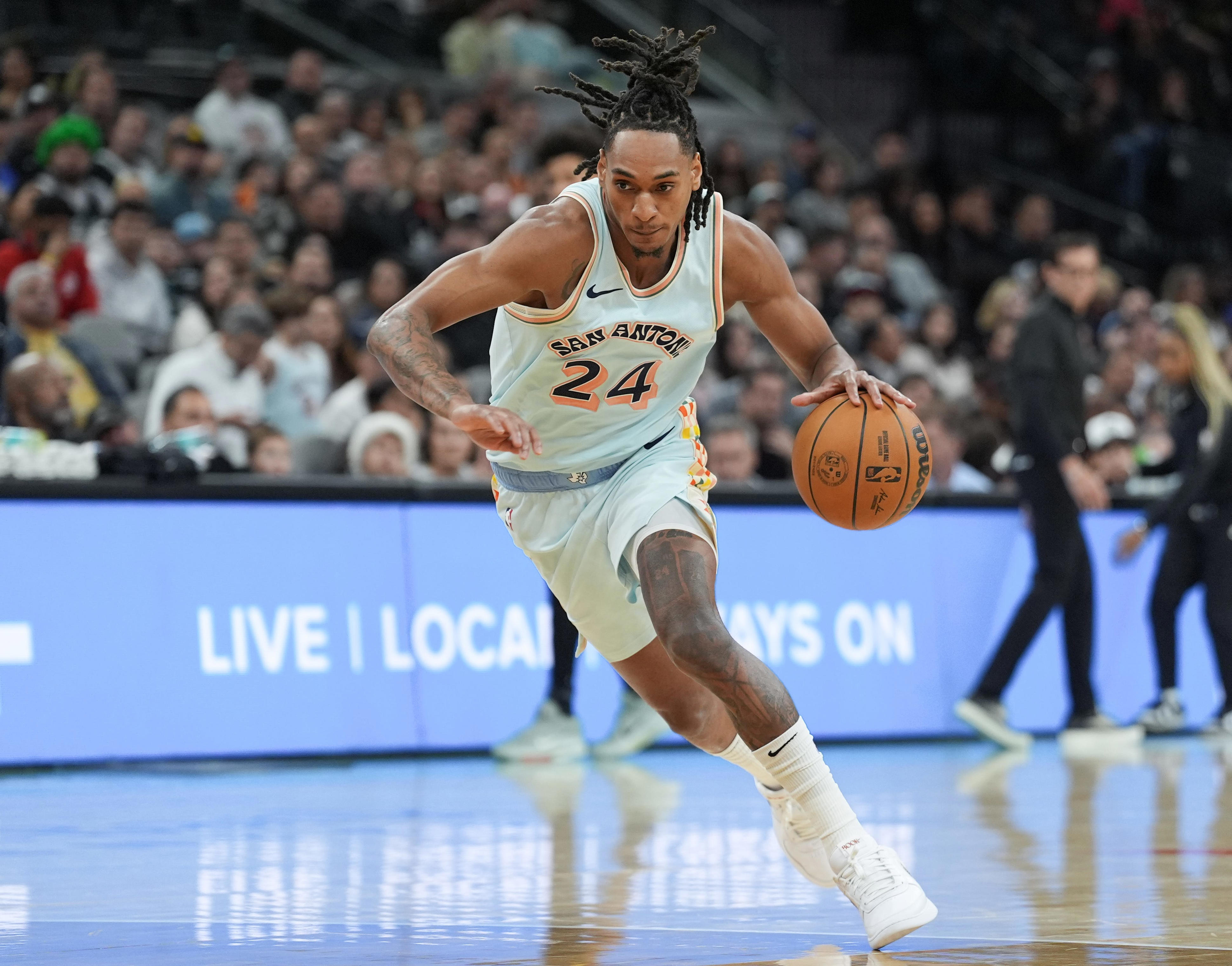 Projected starting lineup for the Spurs after a trade united De'Aaron ...