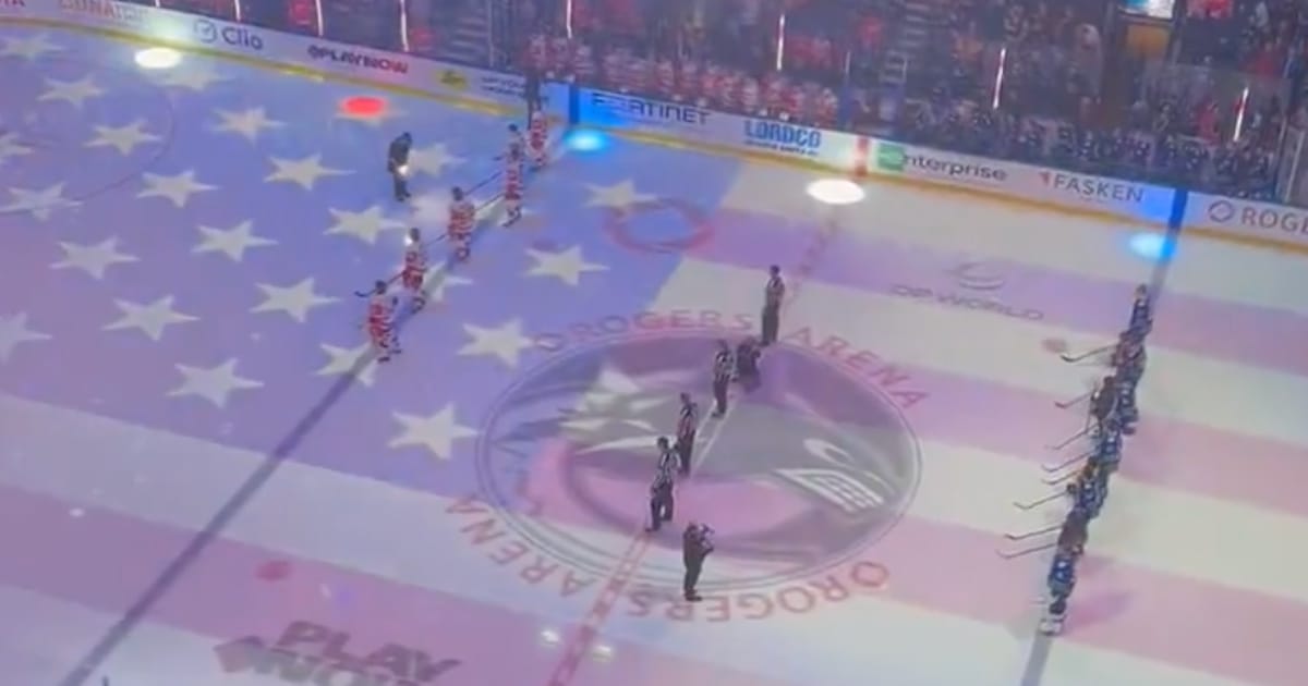 Vancouver Canucks fans boo the U.S. national anthem