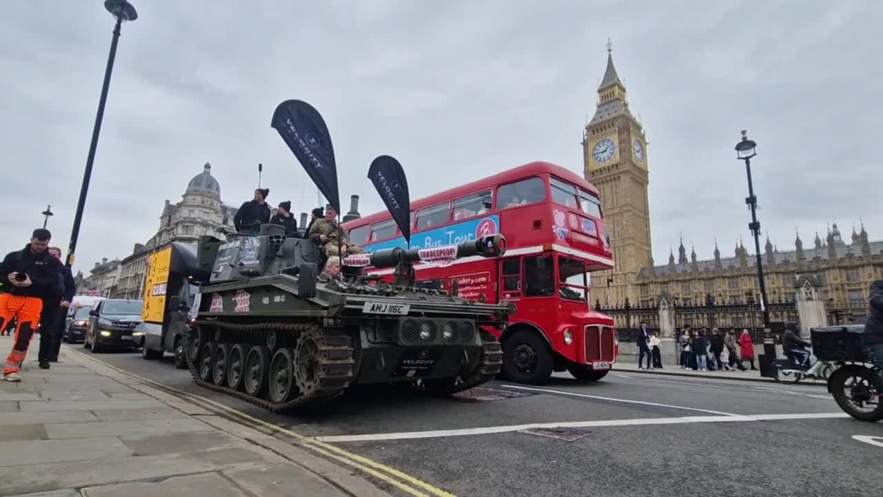 An army TANK rolls through Westminster as hundreds of tradespeople ...