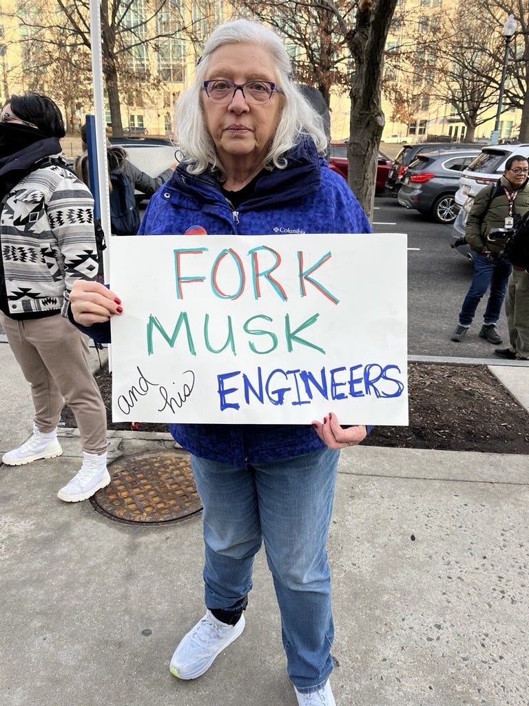 'Fork off': Protesters gather outside OPM to condemn Elon Musk ...