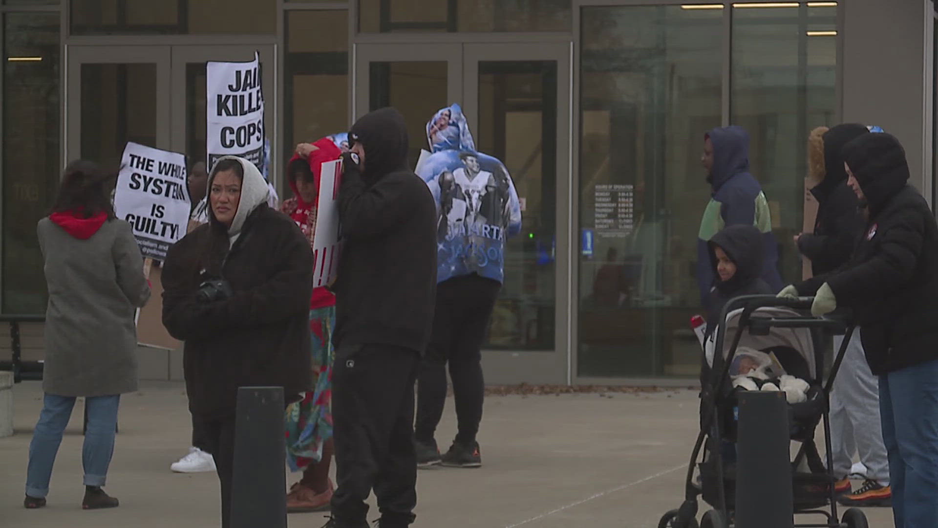 Community members protest lack of charges in fatal police shooting of ...