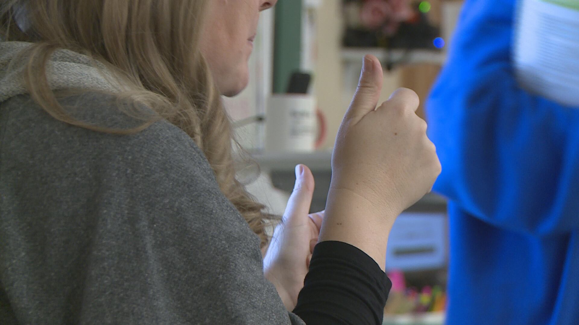 ASL interpreters benefiting entire classrooms