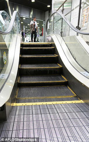 Pictured: The world's shortest escalator, which has just five steps and ...