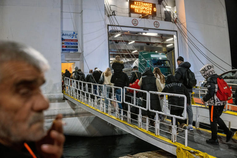 Thousands of tourists flee Santorini on ferries in mass exodus after ...