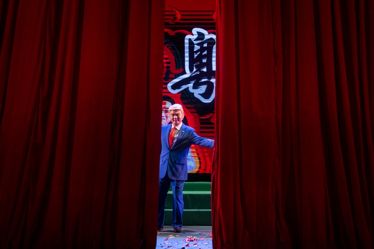AP PHOTOS: In a modern twist to Cantonese opera, Trump sings in Chinese ...