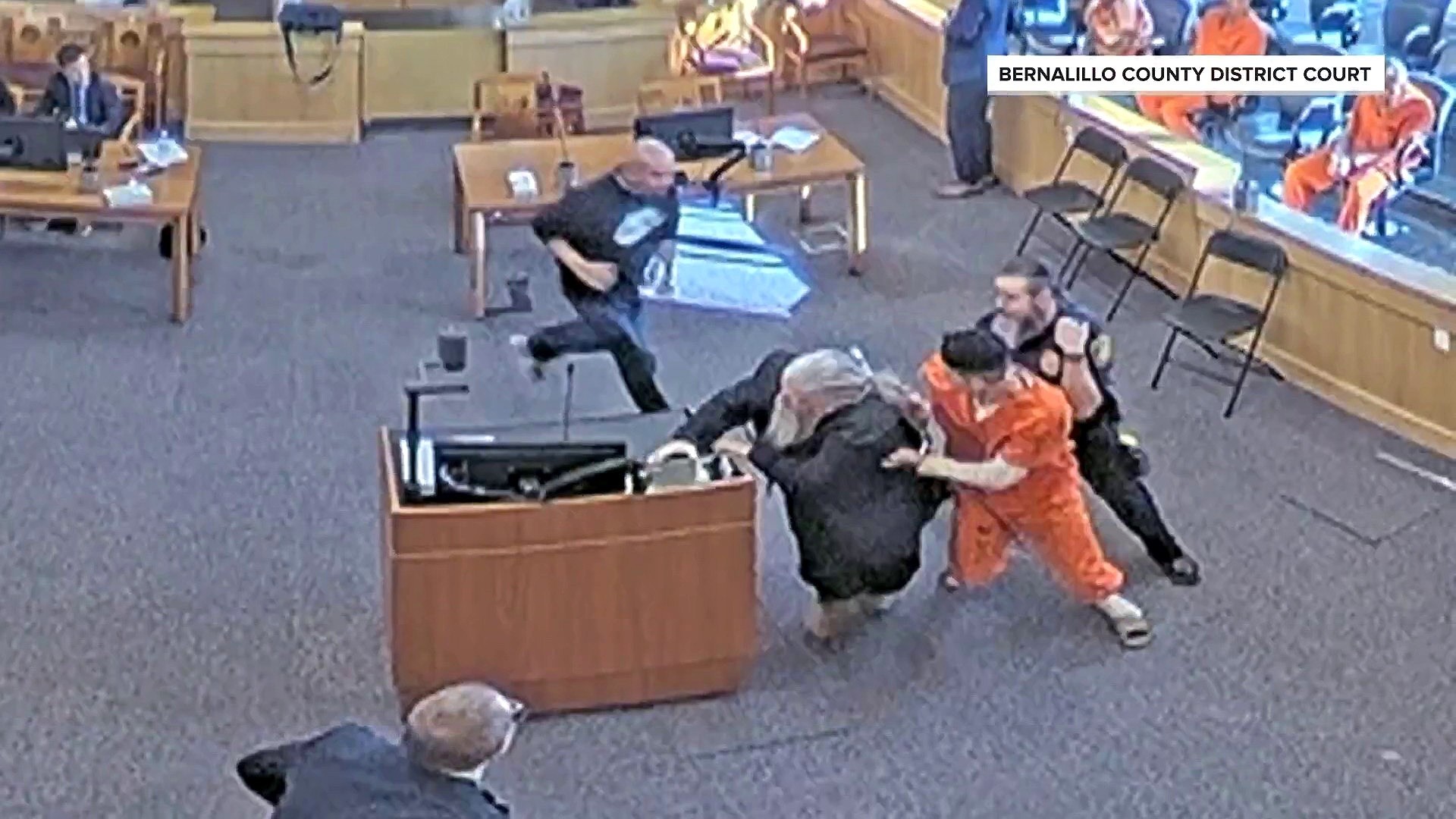 Murder suspect attacked by victim's family in wild courtroom brawl