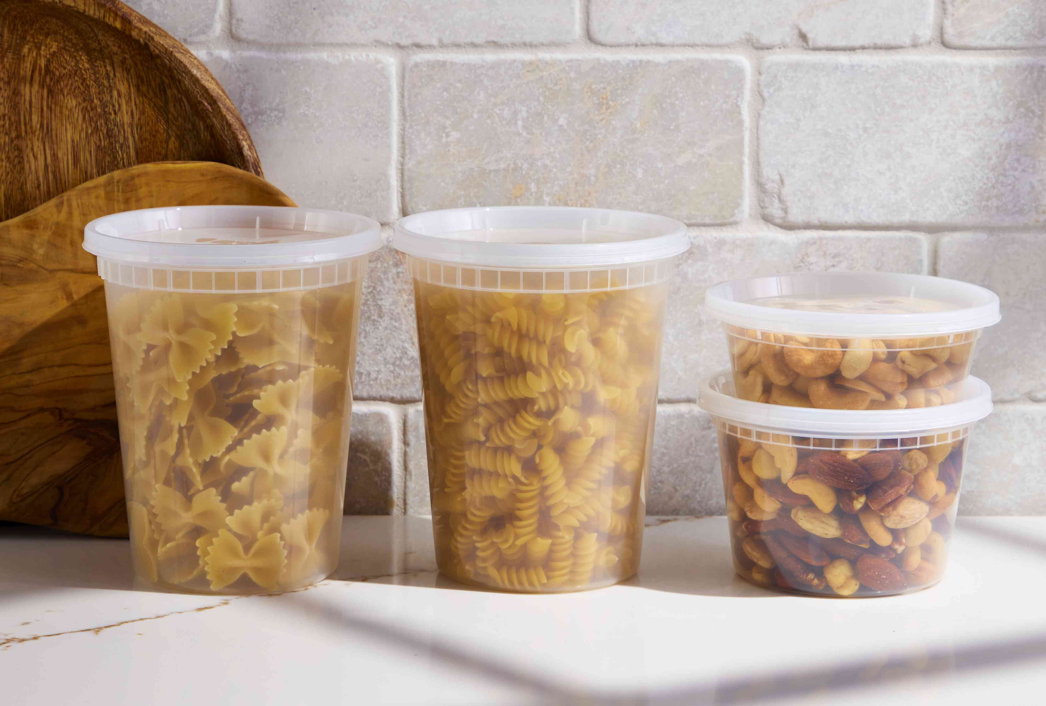 Have Tons of Leftover Food Containers? 12 Genius Ways to Reuse Plastic Lids