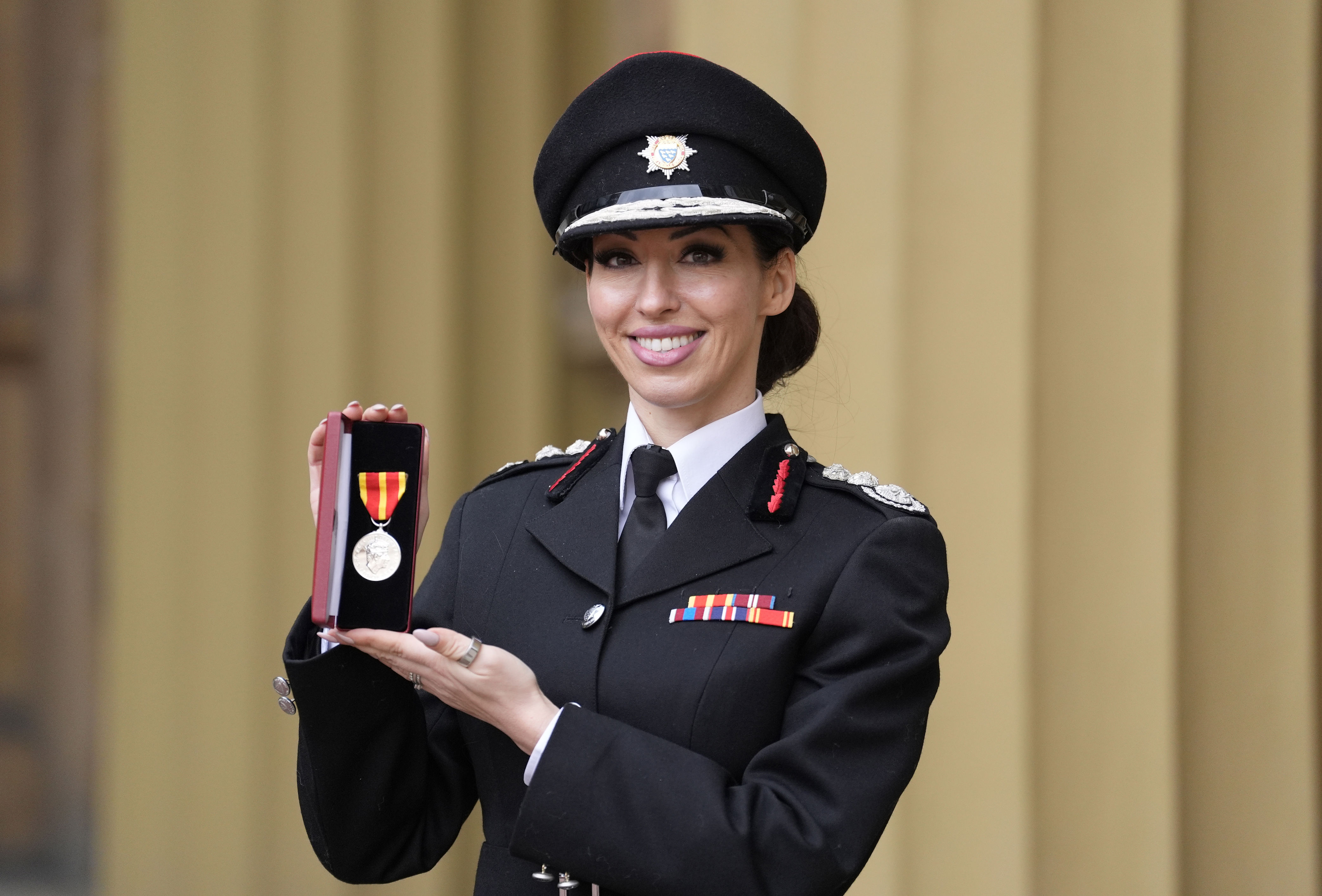 Firefighter who battled poverty and homelessness as a teenager honoured ...