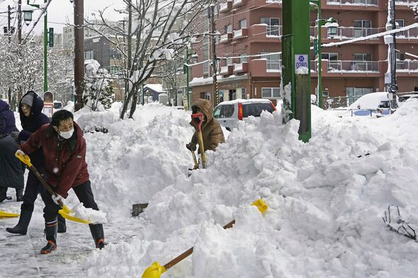 Nation buried in snow after 4ft lands in a single day as weather ...