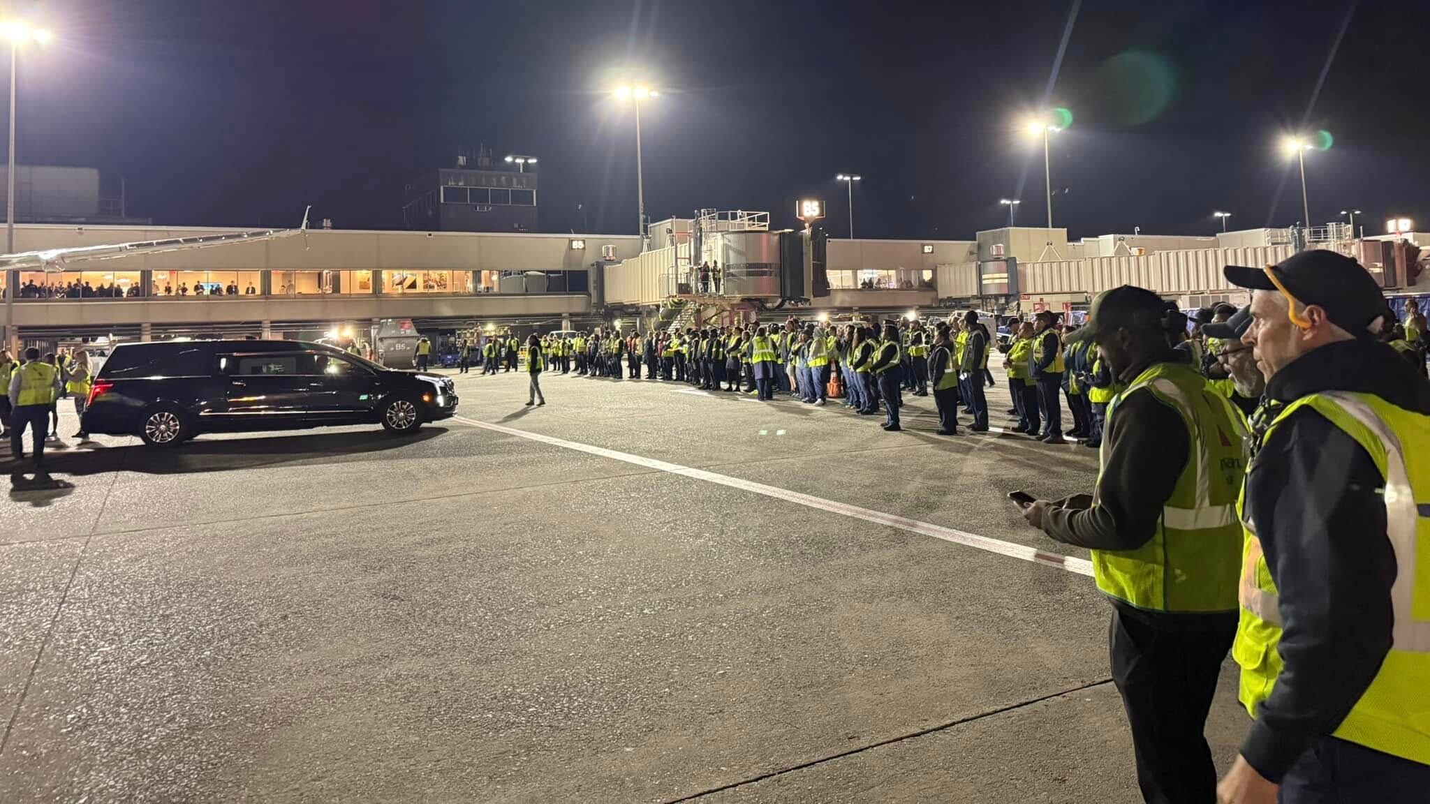 Crews lined tarmac as body of flight attendant killed in DC plane crash ...