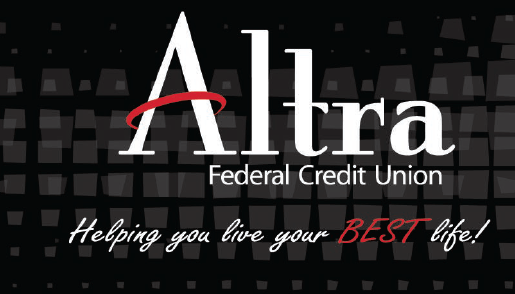 Altra holding a ribbon cutting at the original branch office in La Crosse