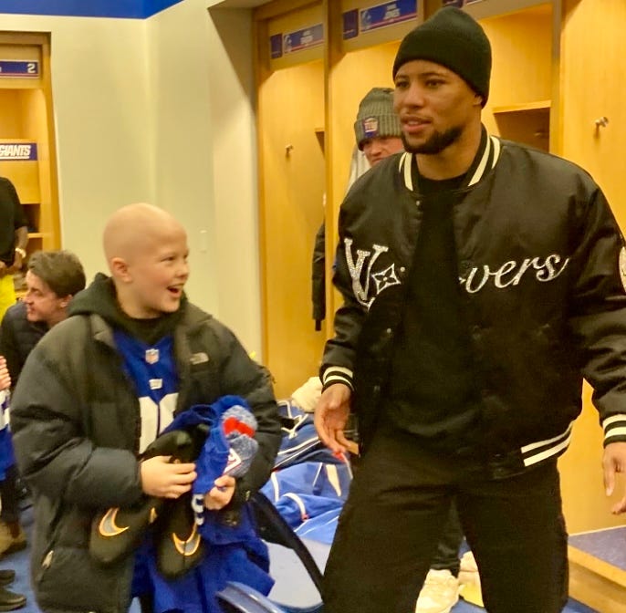 'Hate the Eagles, but Saquon's my hero': Unique bond has Giants fan ...