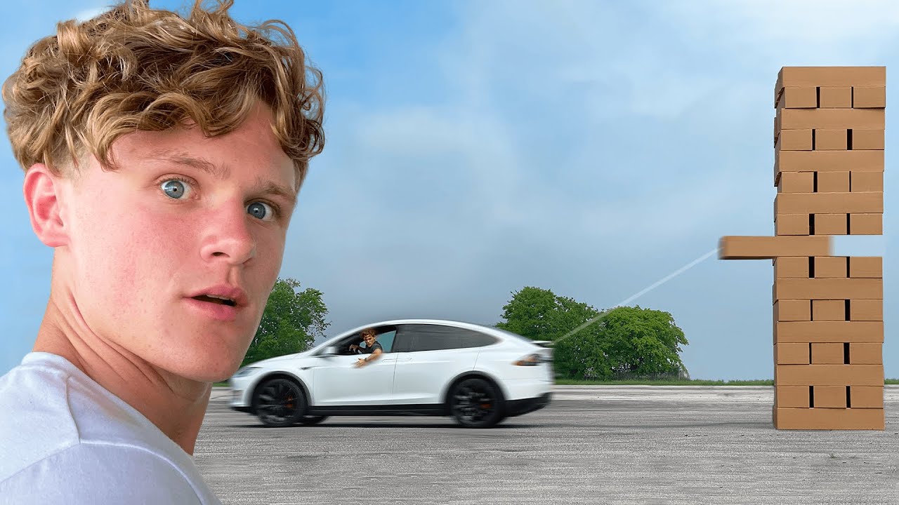 World’s fastest car vs. giant Jenga tower