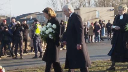Swedish royals and officials lay wreaths at scene of shooting
