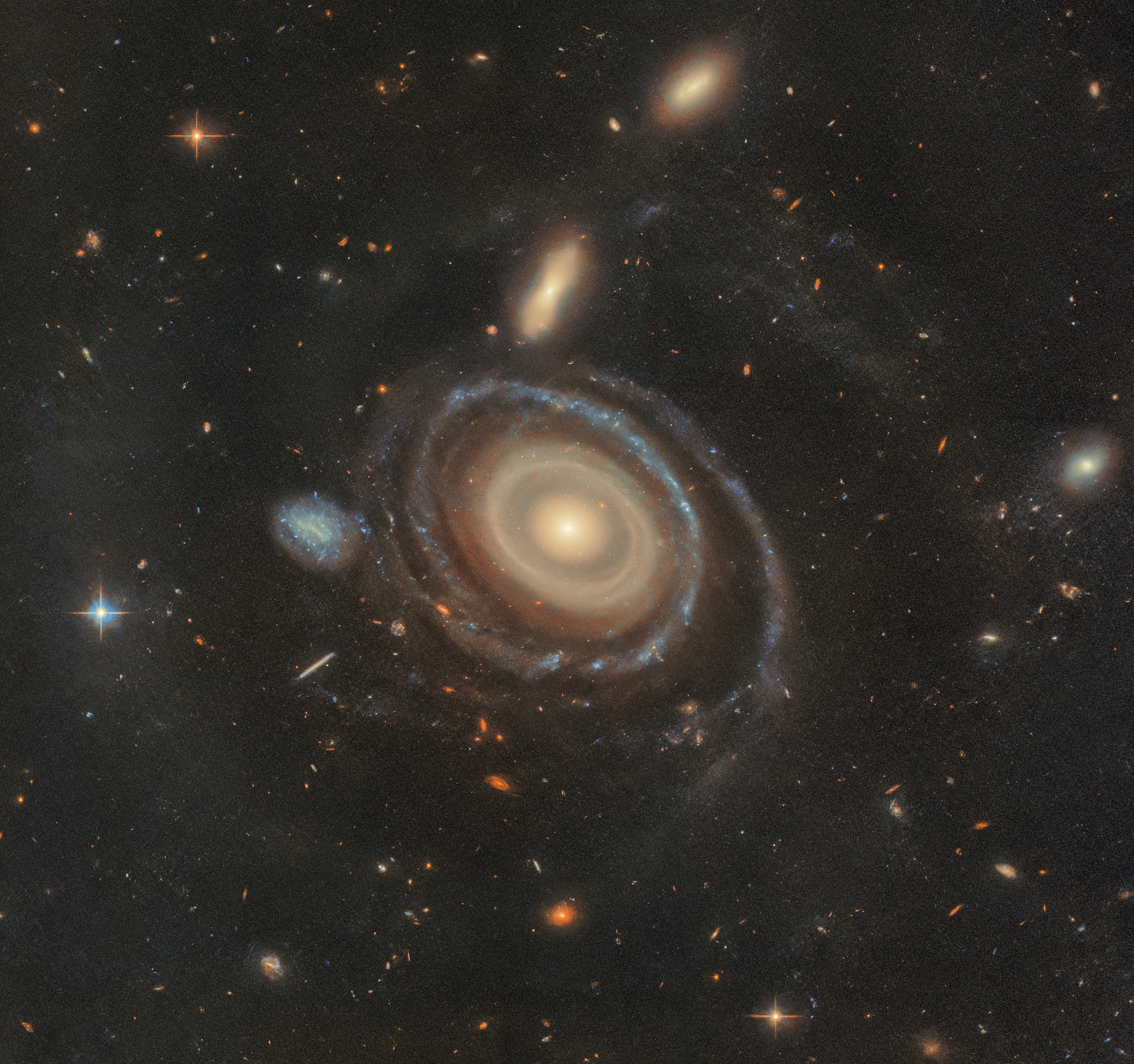 Hubble spots a cosmic bullseye: a galaxy with nine rings