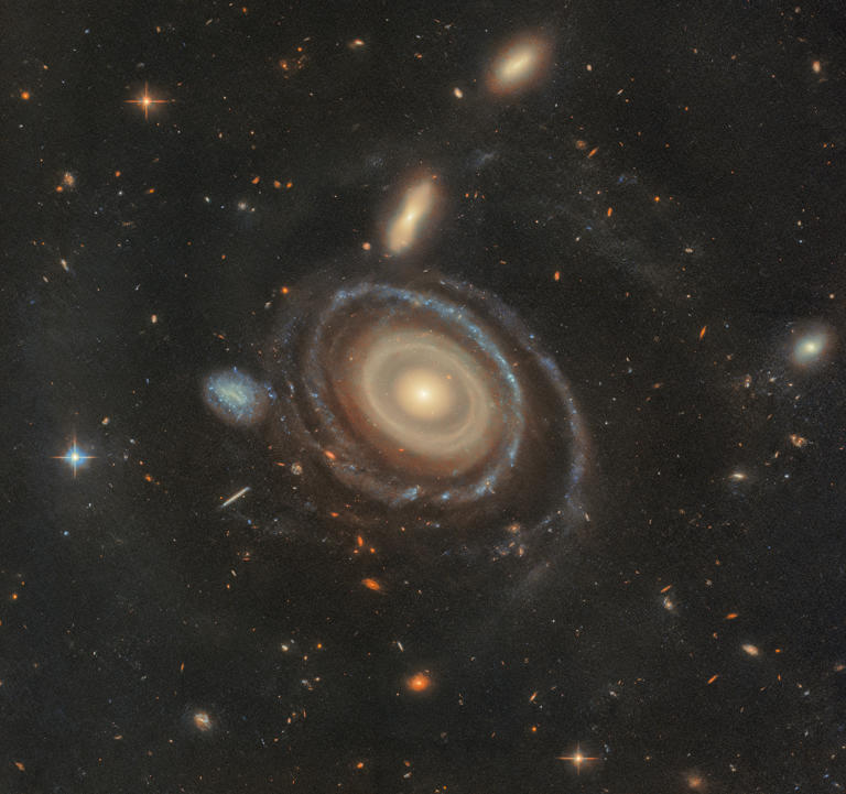 Hubble spots a cosmic bullseye: a galaxy with nine rings