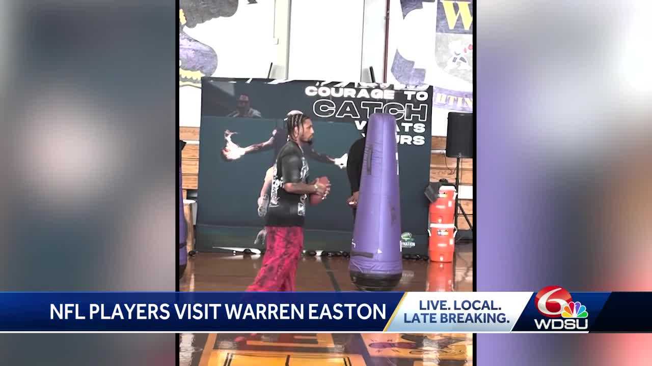 Watch the heartwarming moment NFL stars surprise Warren Easton students