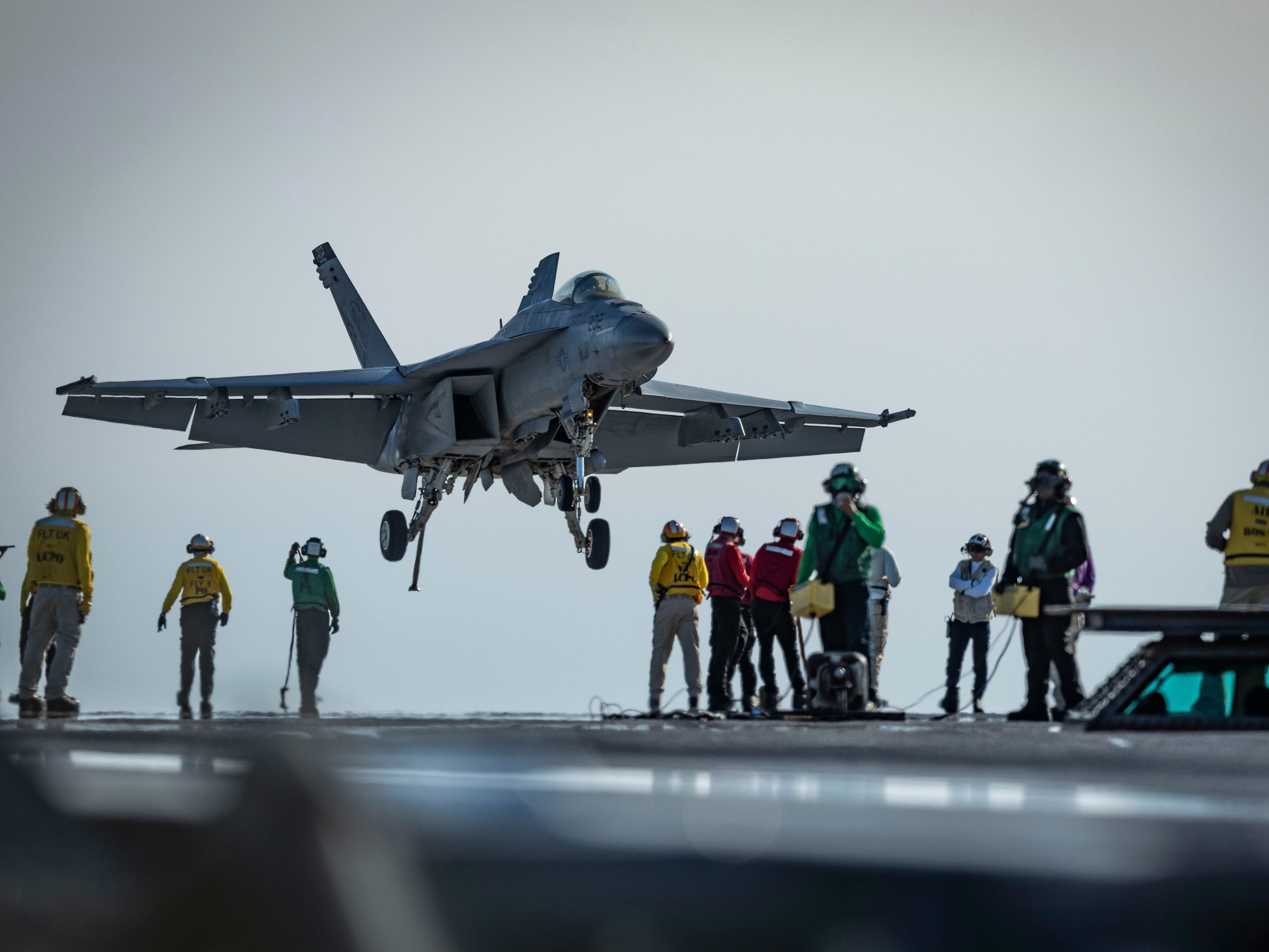 A US Navy pilot narrowly avoided crashing into the sea by as little as ...