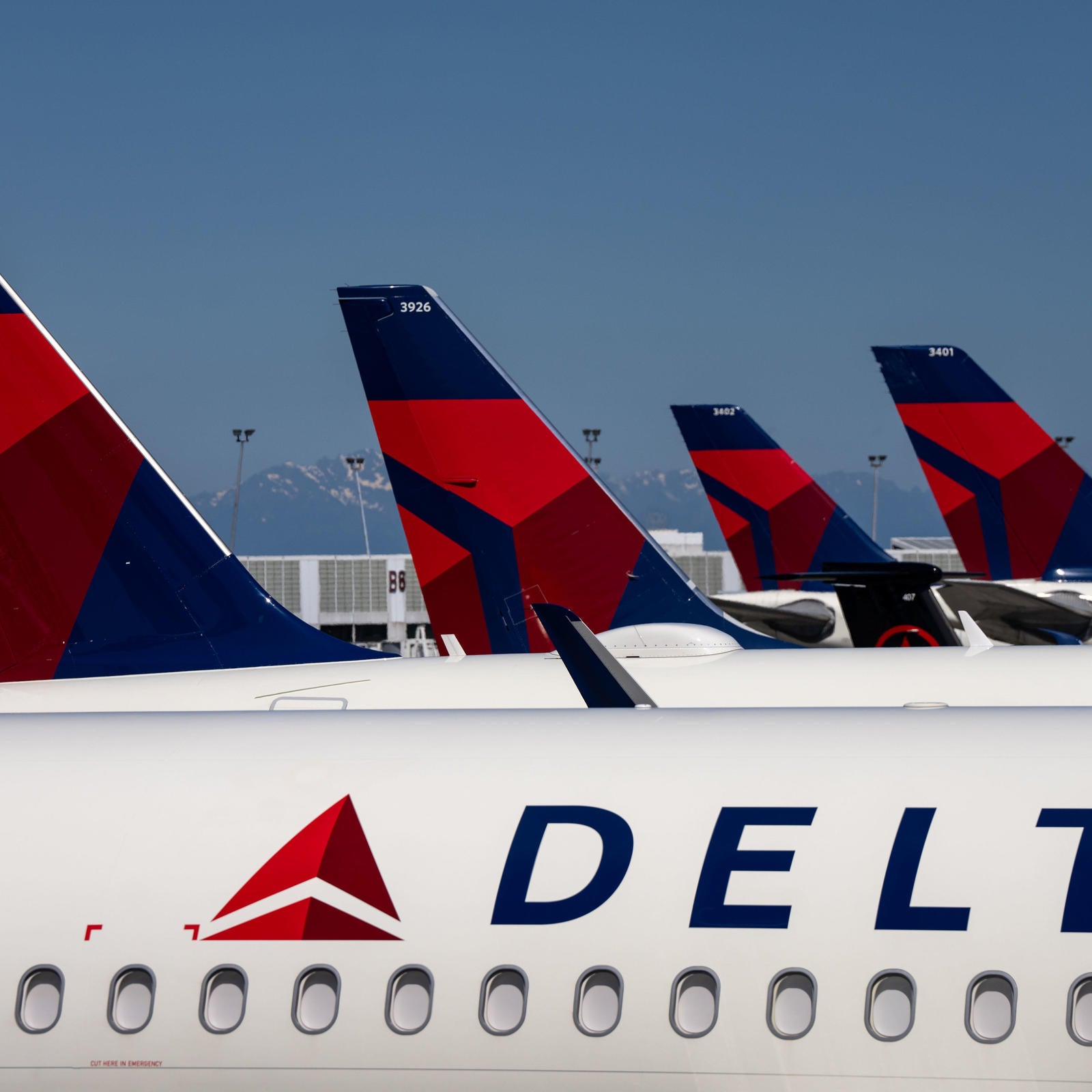 Japan Airlines flight bumps Delta plane while taxiing in Seattle