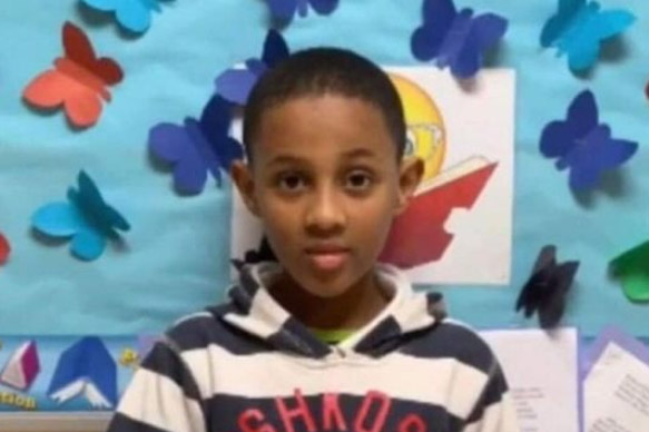 Man tried to shield child from fire in final act, official testifies