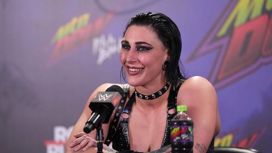 WWE star Rhea Ripley heats up the room with lingerie and exotic body tattoo