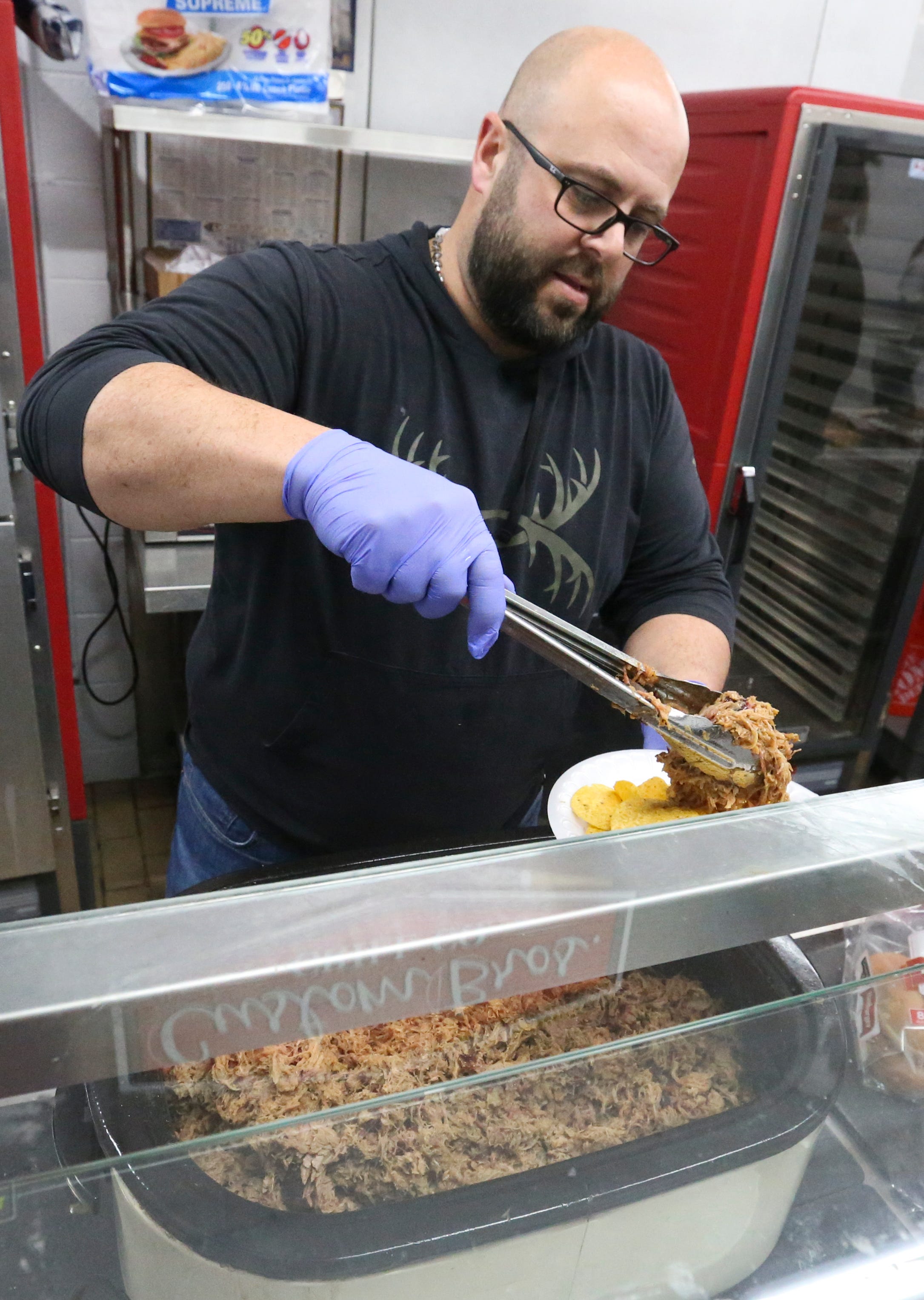 'I'm fat and I love to cook': Pulled pork nachos by basketball fan ...