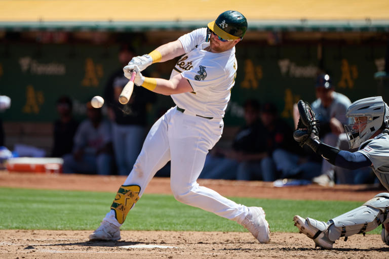 Athletics outright Kyle McCann, Anthony Maldonado