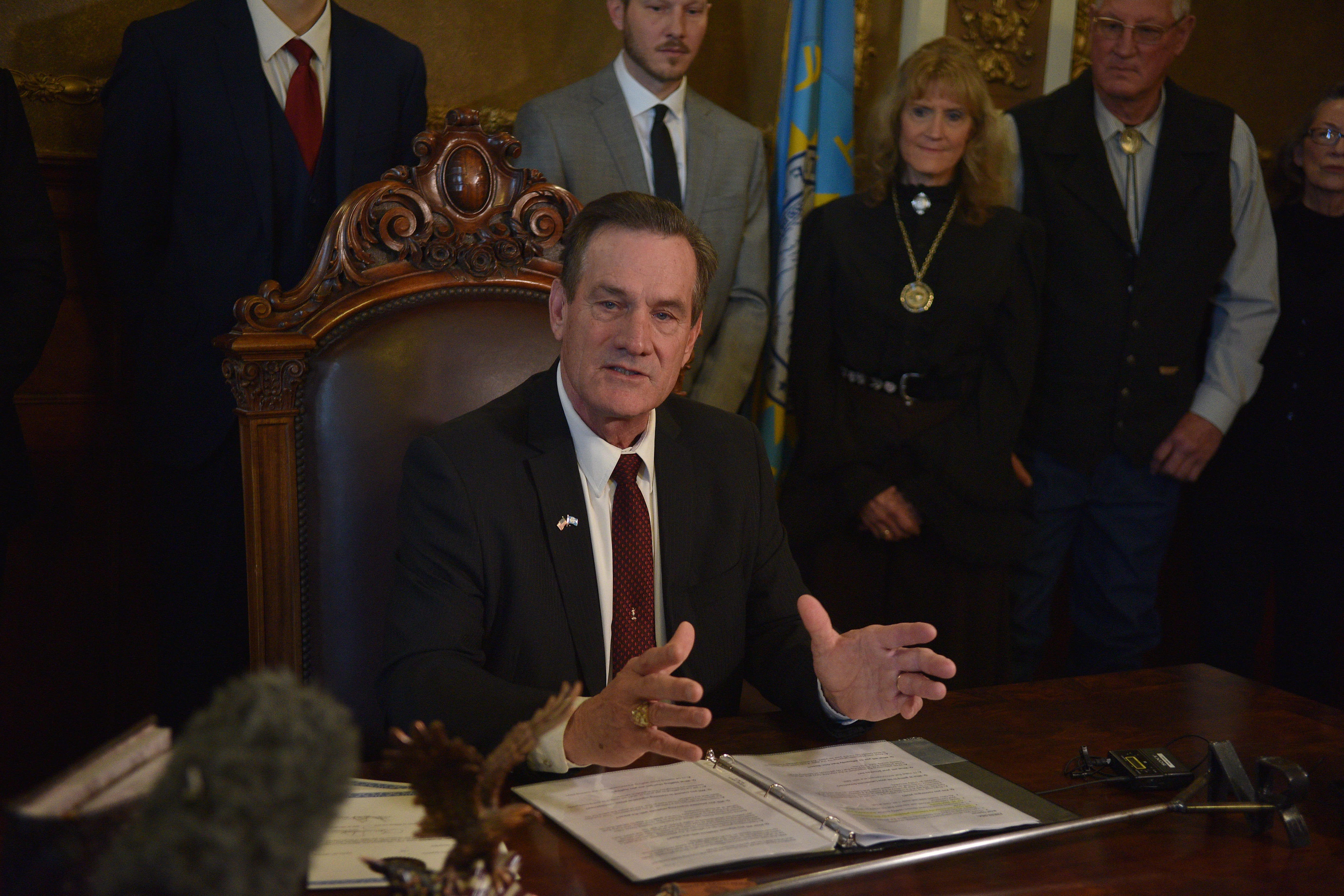 Gov. Larry Rhoden signs age verification bill, lab-grown meat funding ...