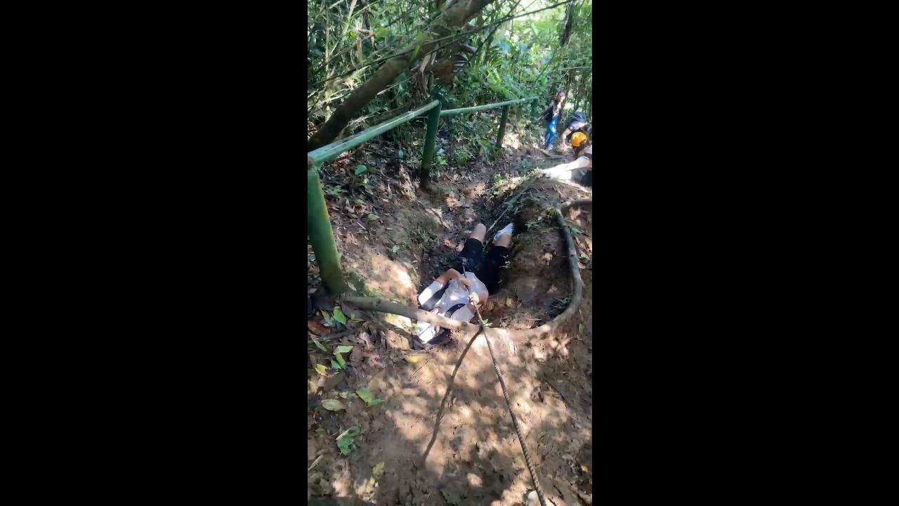 Man Feeling Goofy Jumps Into Muddy Hole