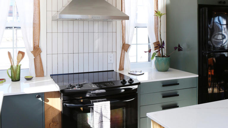 Here's The Secret To Making Mixed Kitchen Cabinets Look Cohesive