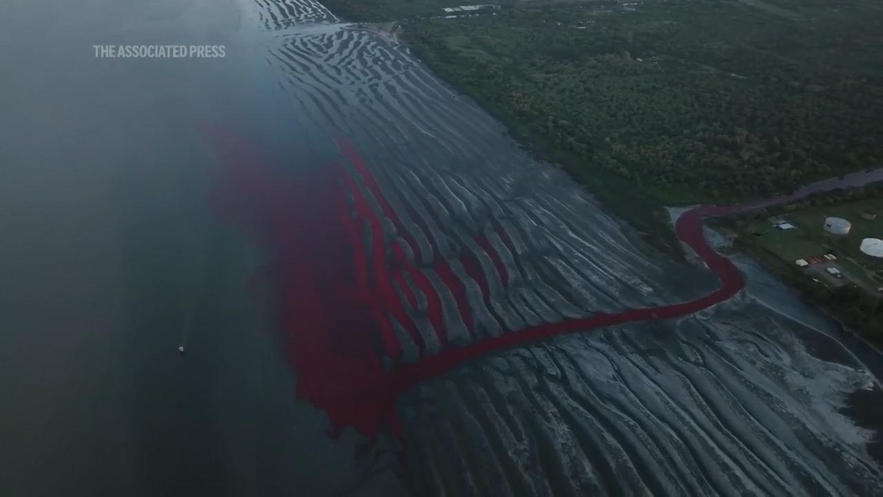 River in Argentina turns red, raising concerns over suspected contamination