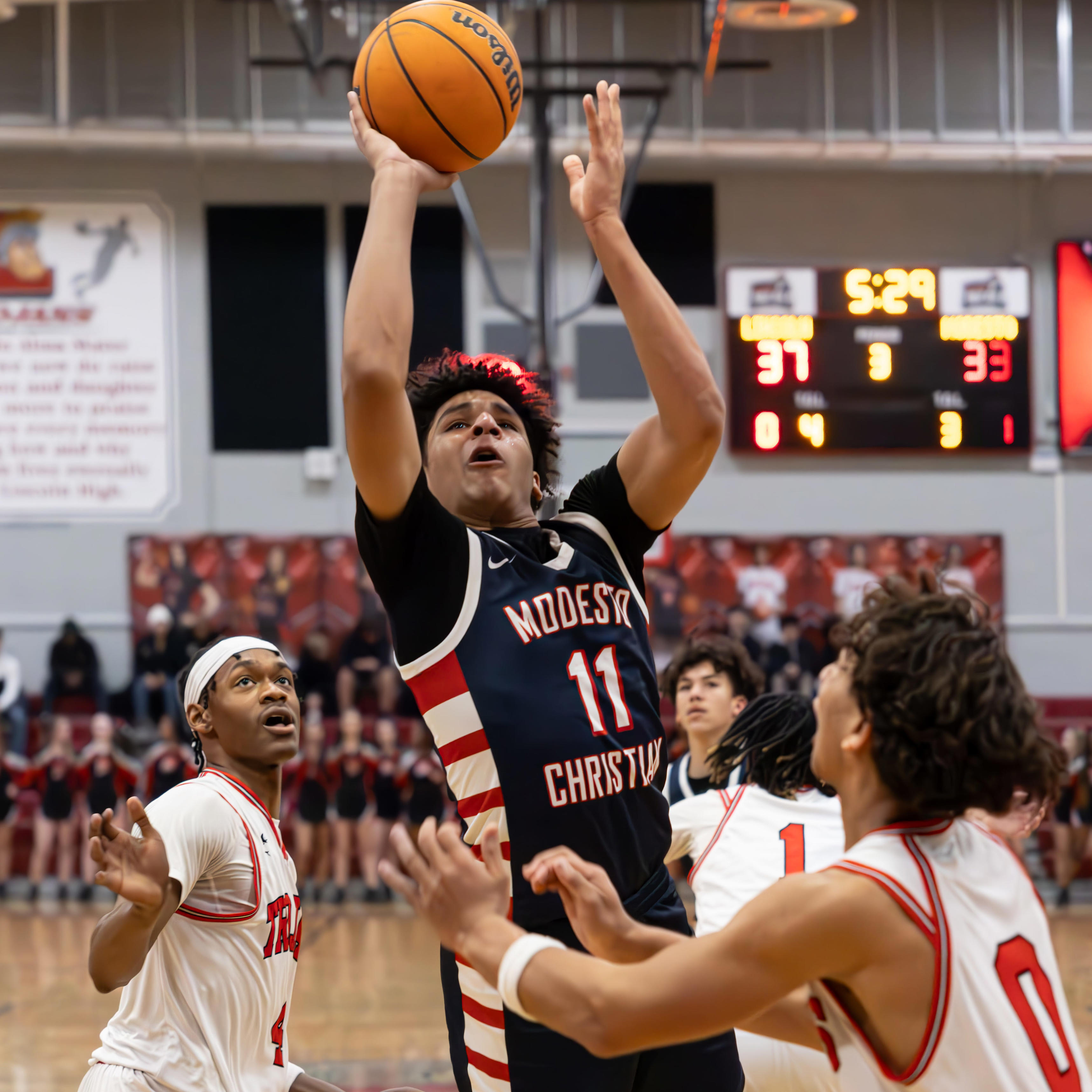 Modesto Christian basketball pushes past Lincoln in OT for Tri-City ...