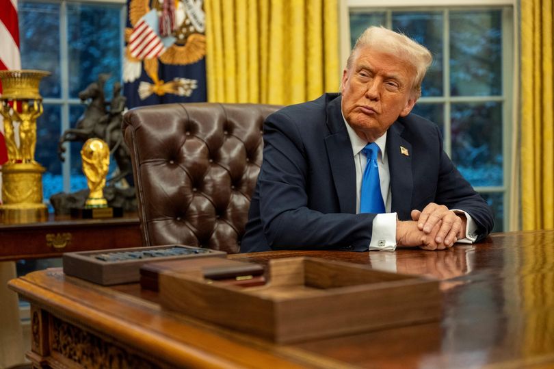 Trump hangs 'badge of honor' photo on Oval Office wall in radical White ...