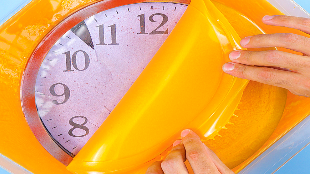 Unique piece of epoxy art using an old clock