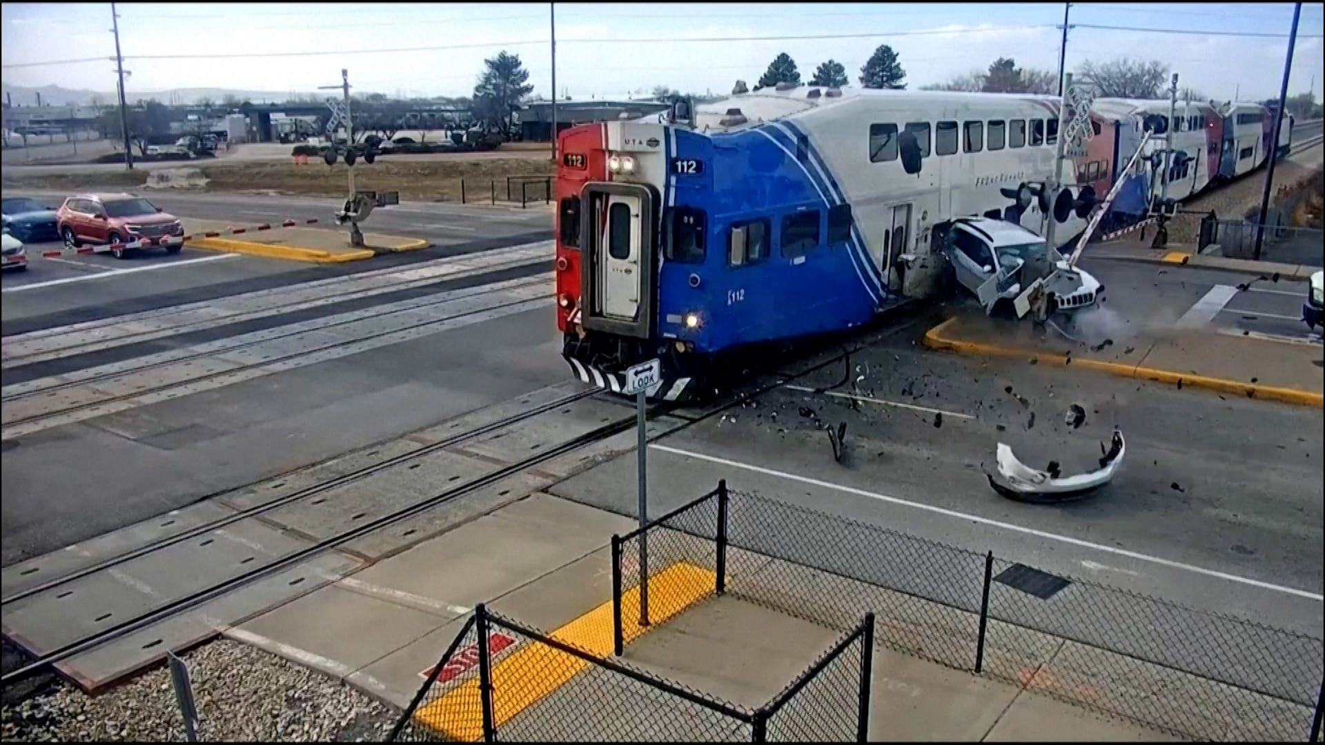 Watch as a train slams into SUV in Utah seconds after frantic driver flees