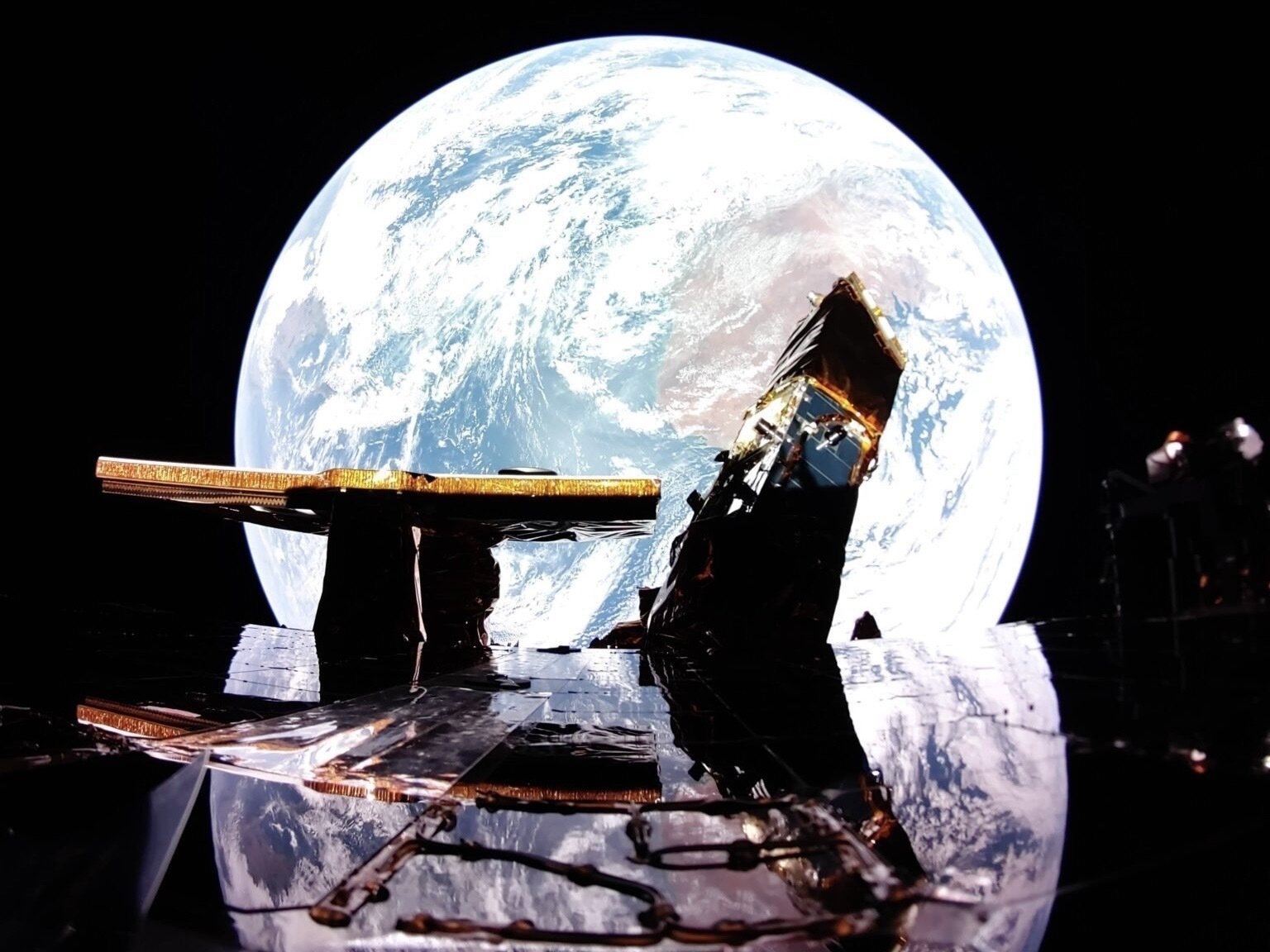 Firefly spacecraft provides striking view of Earth on top of Earth