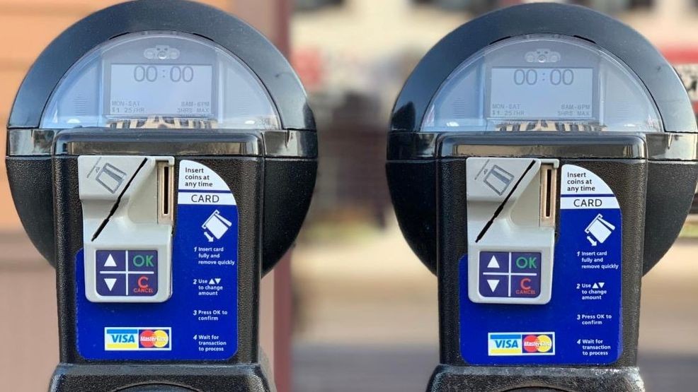 Traverse City warns of scam as fake QR codes found on parking meters