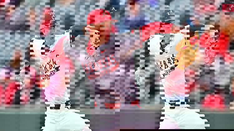 Razorbacks pull off extra innings win in game one of opening day double ...