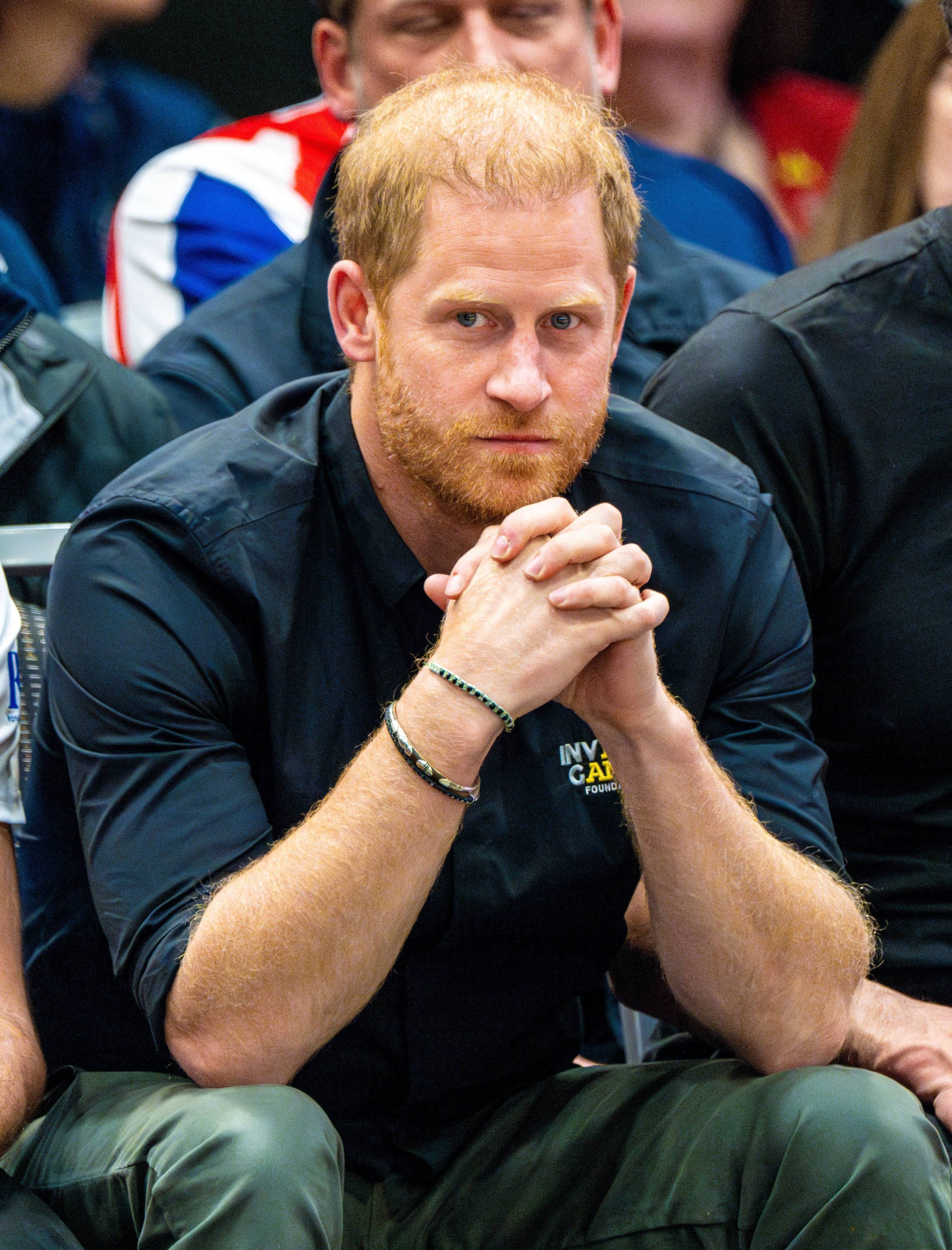 Meghan Markle posts Prince Harry kissing photo as they celebrate ...