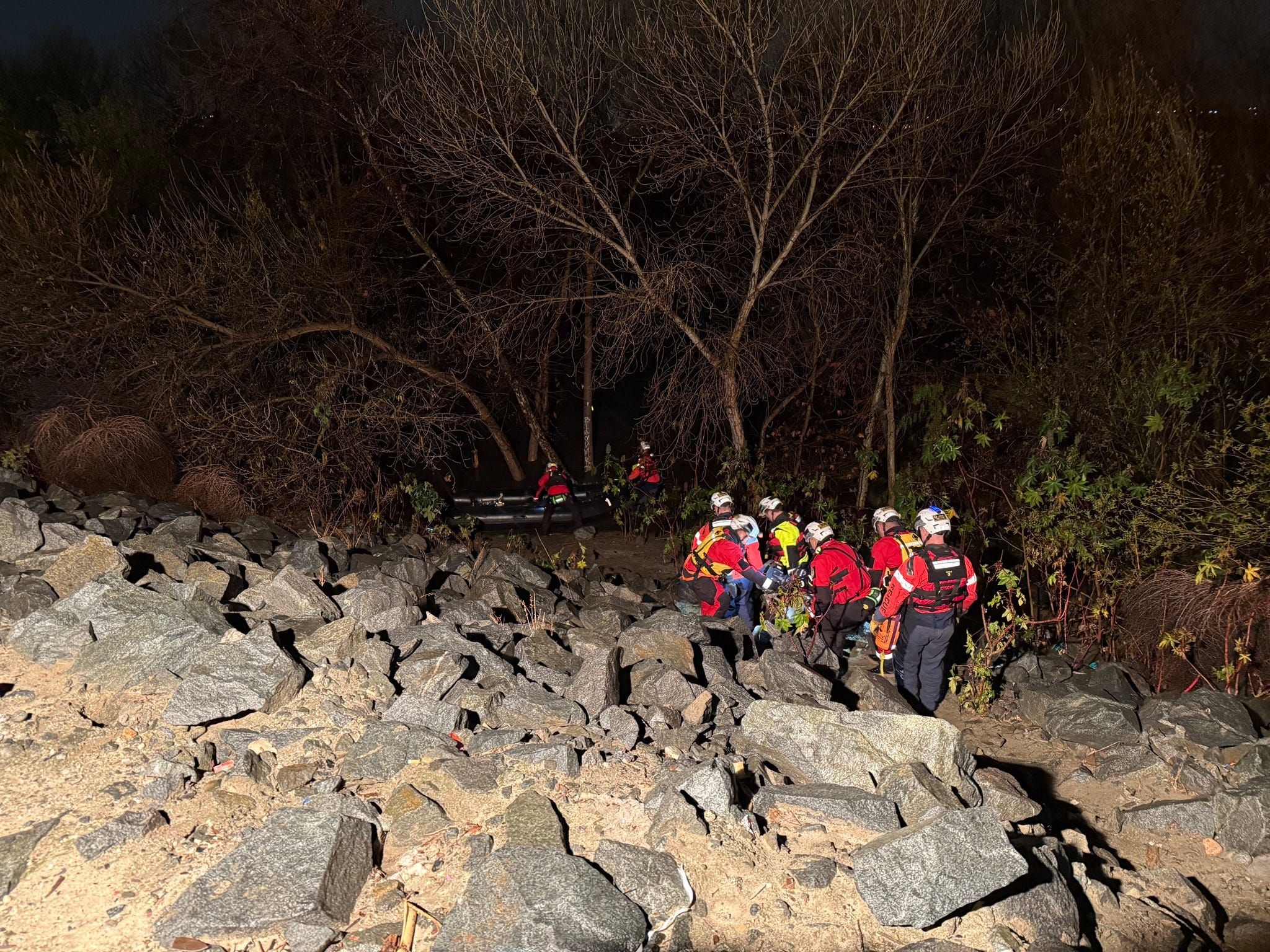 2 men and 2 dogs saved from Santa Ana river bottom