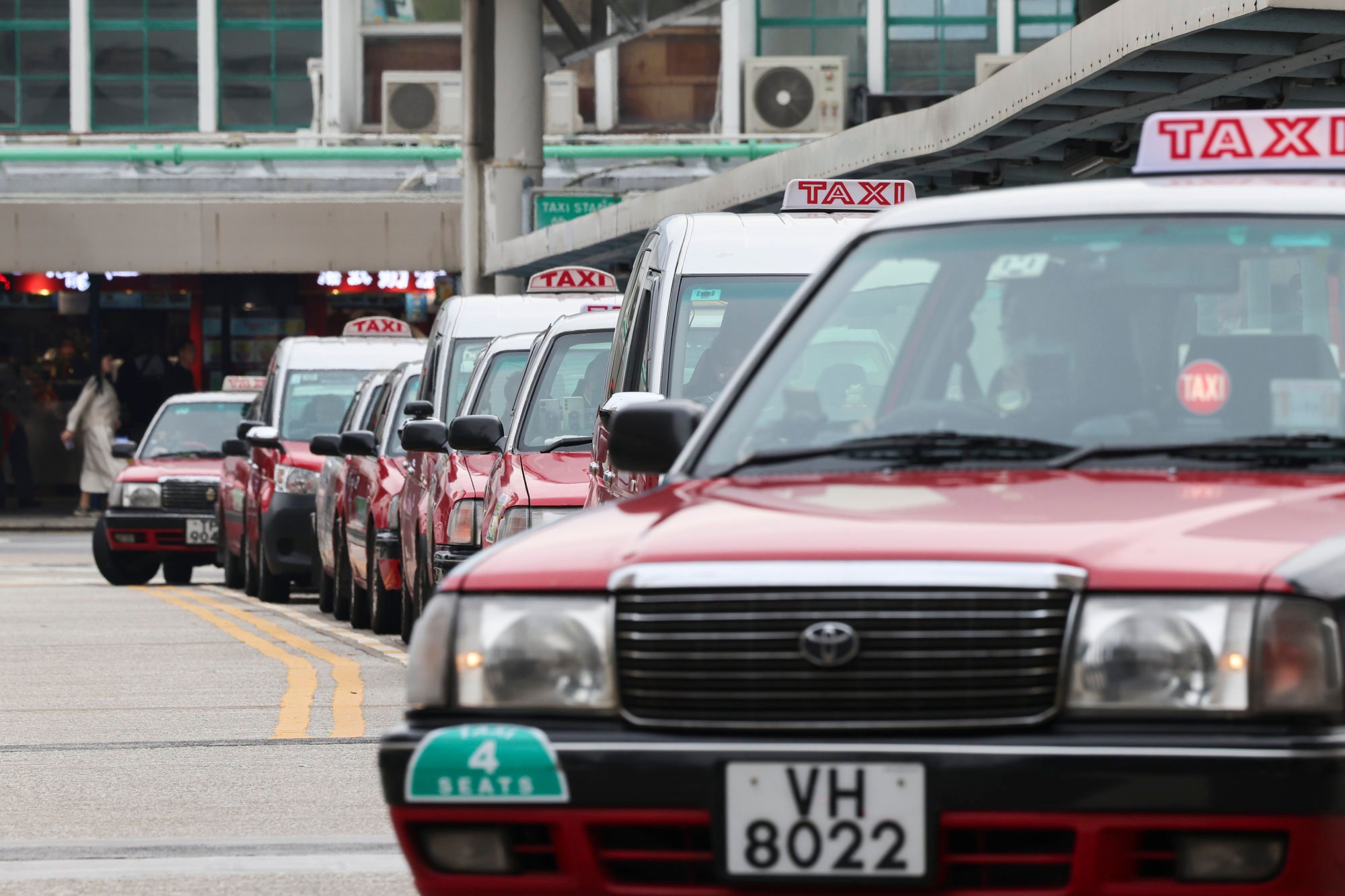Hong Kong taxis take wrong road for public yet again