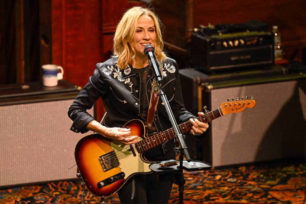 Sheryl Crow Waves Goodbye to Her Tesla, Pledges Money to NPR